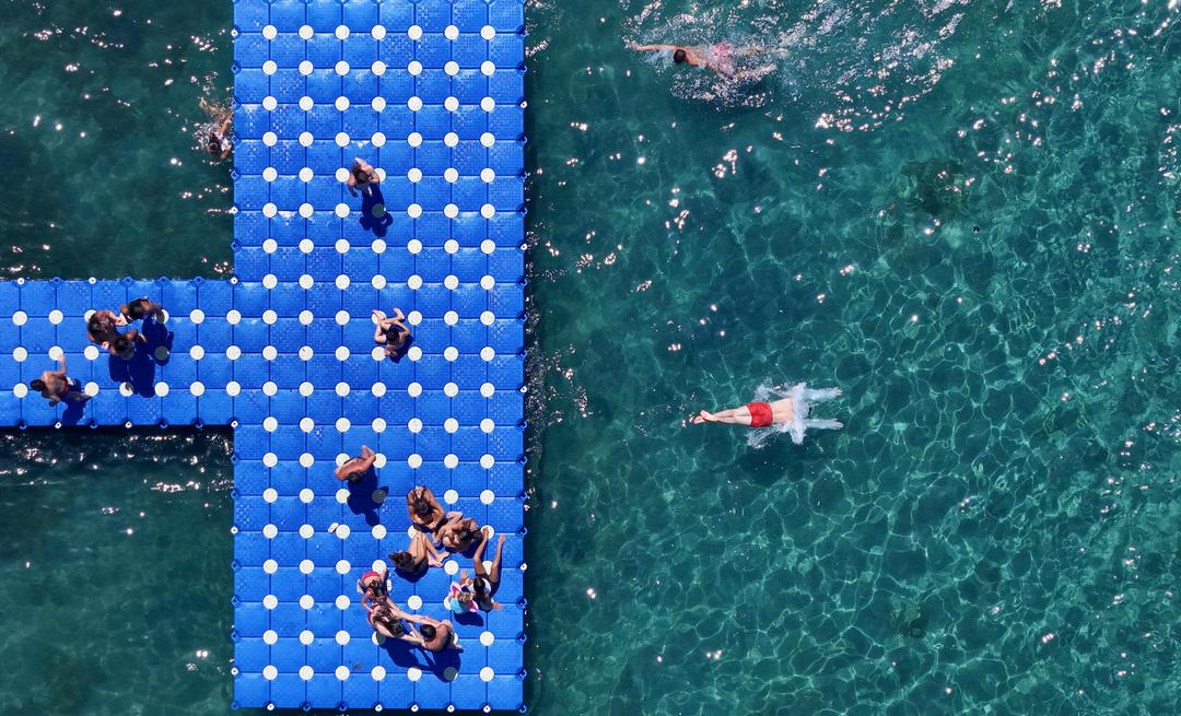 Day in Photos: Soweto Immigration Protest, Heat Wave in Europe, and ...
