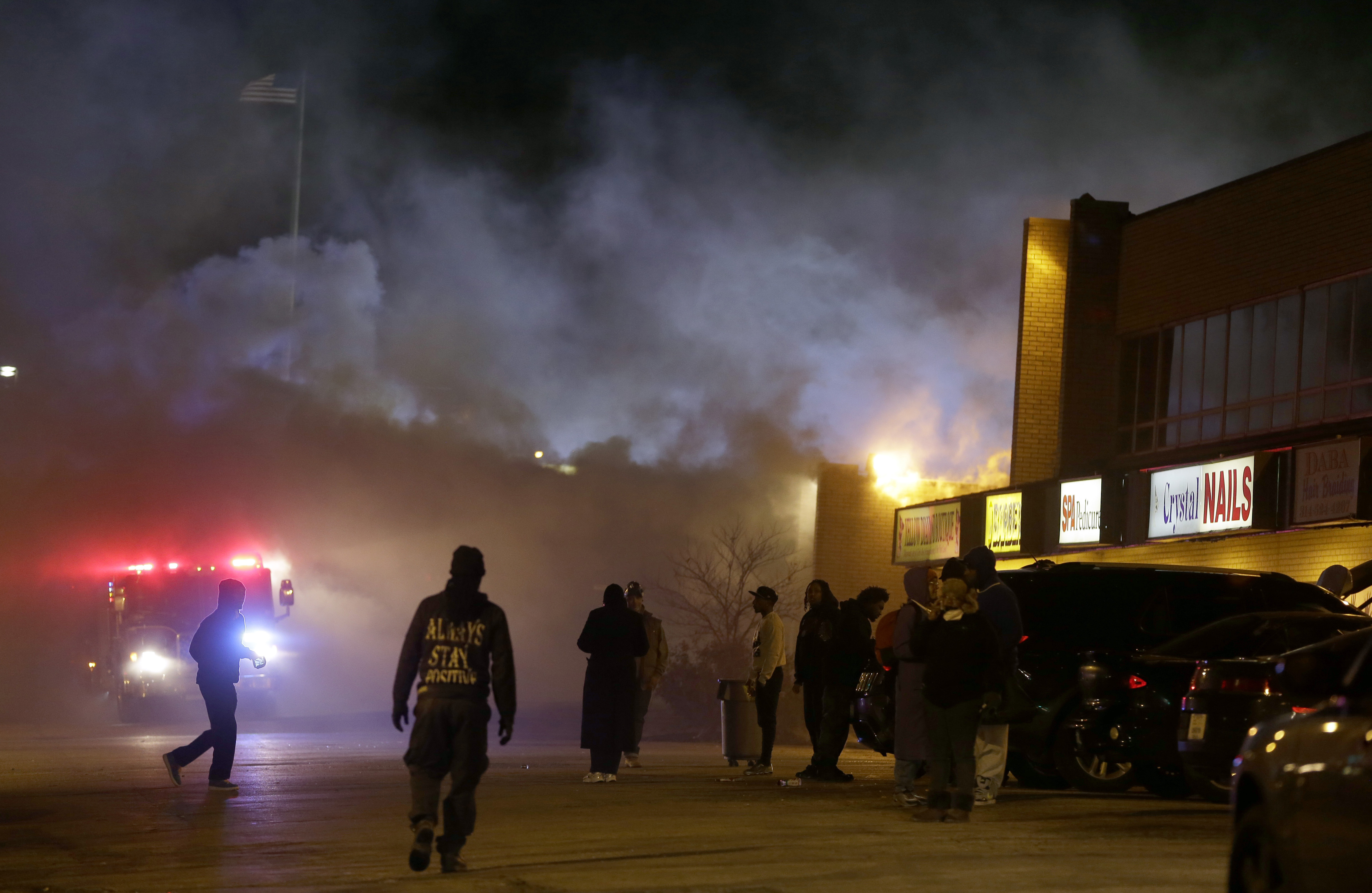 Ferguson Photos: Walgreens Fire, Cop Cars on Fire, Dollar Tree Looted ...